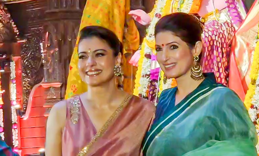 Twinkle Khanna poses with her 'Two Much With Kajol and Twinkle’ co-host during Durga Puja